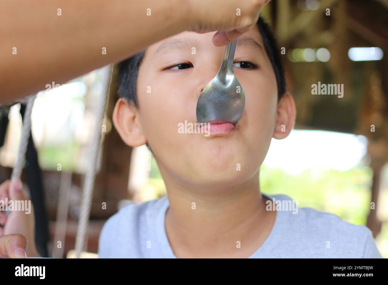 A young boy experiencing the joy of eating, showcasing a delightful ...