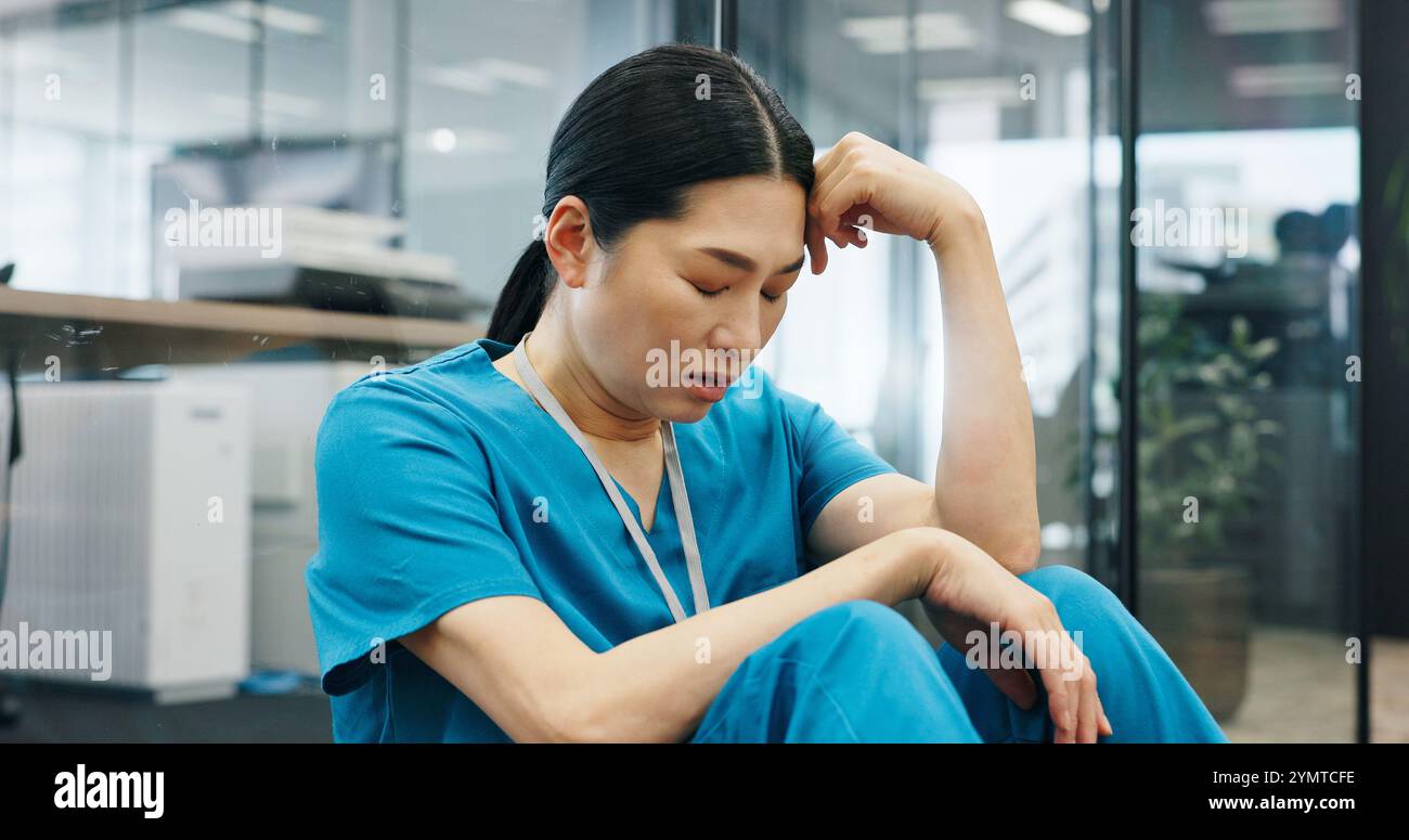 Japanese, woman and nurse with headache in hospital of healthcare ...