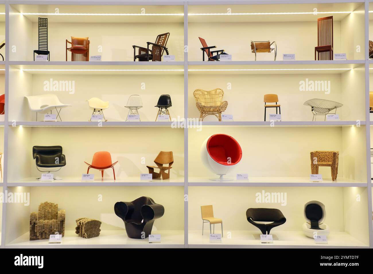 Miniatures of designer chairs on display in the store window at the ...