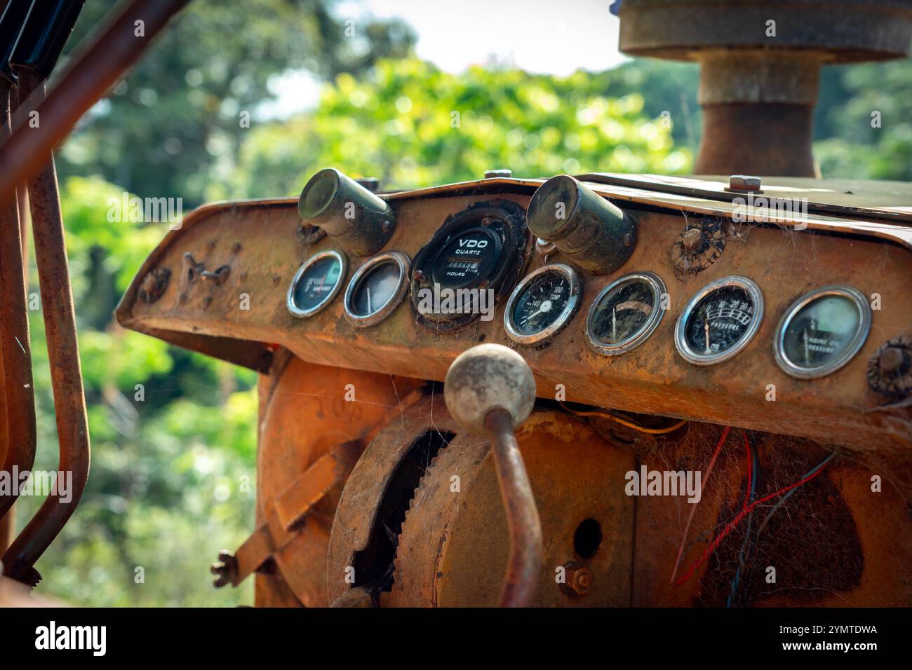 Old tractor engine RPM gauges dashboard Stock Photo - Alamy