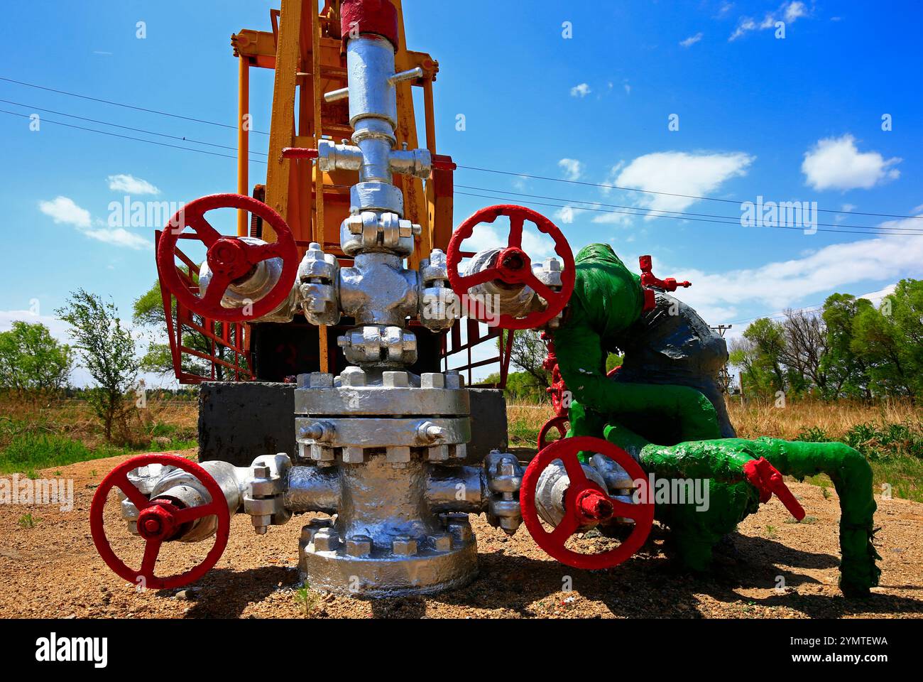 Oil pipes and valves Stock Photo - Alamy