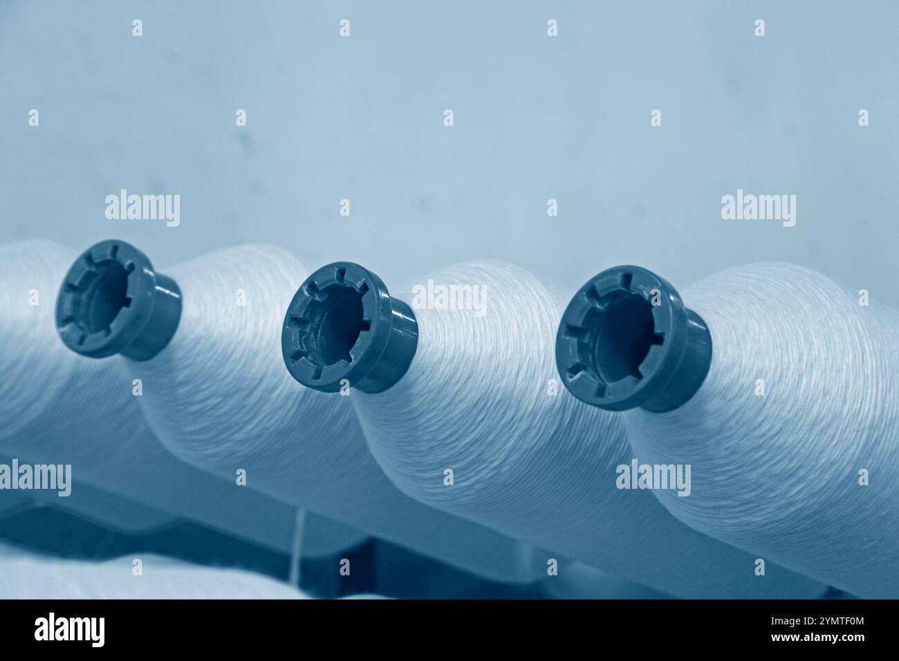 In industrial sewing machine spun yarn, many thread together Stock ...