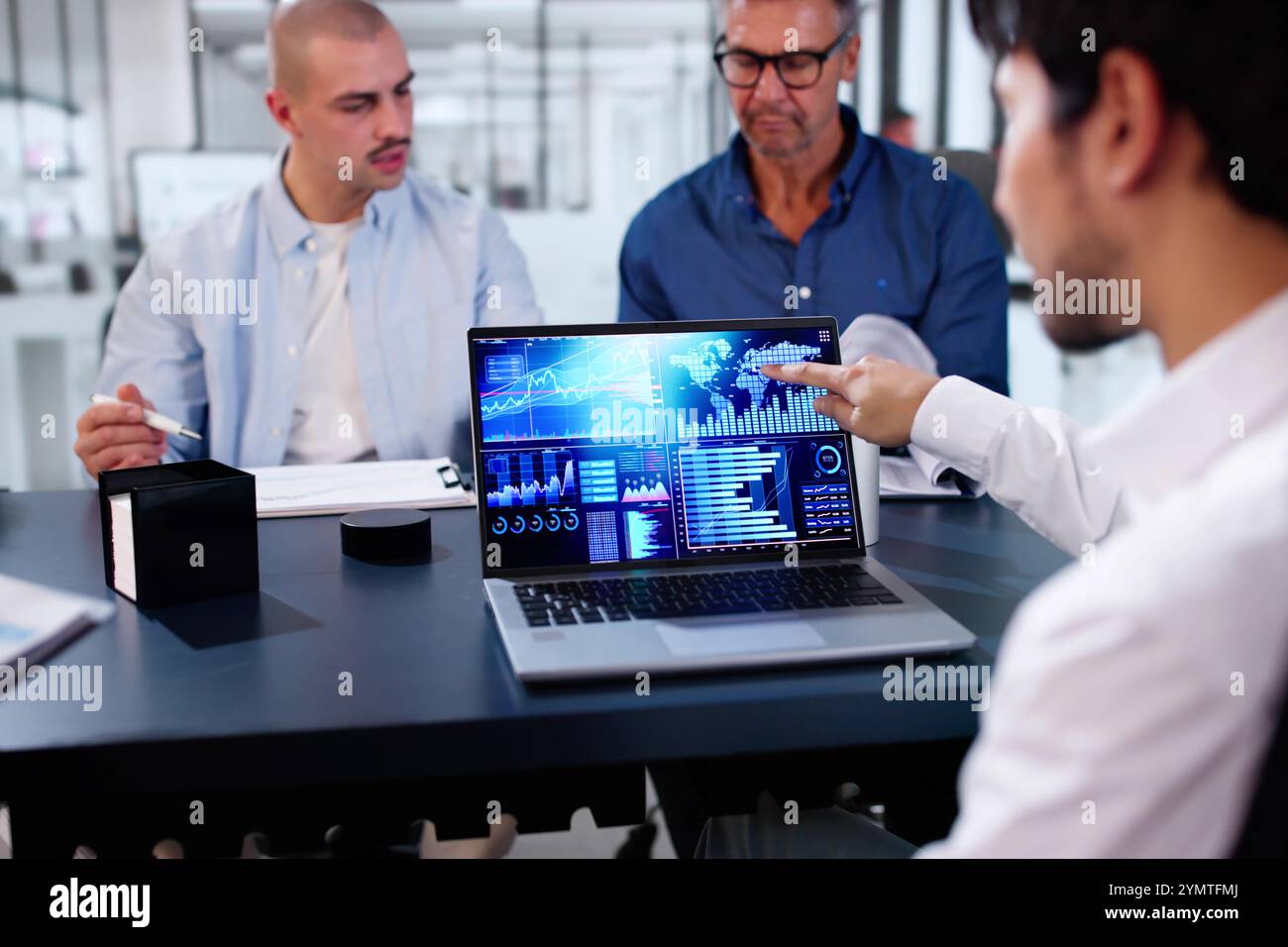 Predictive Business Analytics On Laptop Computer. Group Of Analysts ...