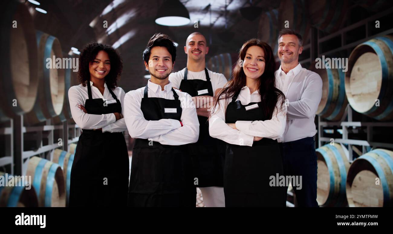 Wine Cellar Team Employees. Staff Group In Warehouse Stock Photo - Alamy