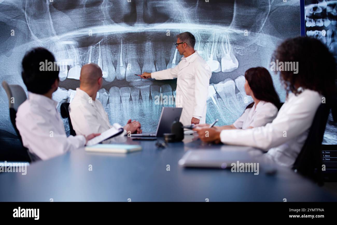 Young asian doctor looking x ray hi-res stock photography and images ...