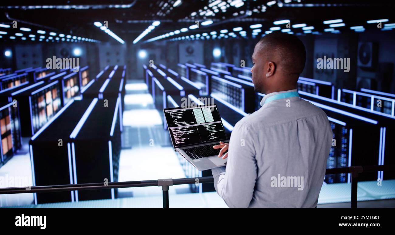 Happy Engineer In Data Center Server Room Configuring AI Technology Stock Photo - Alamy