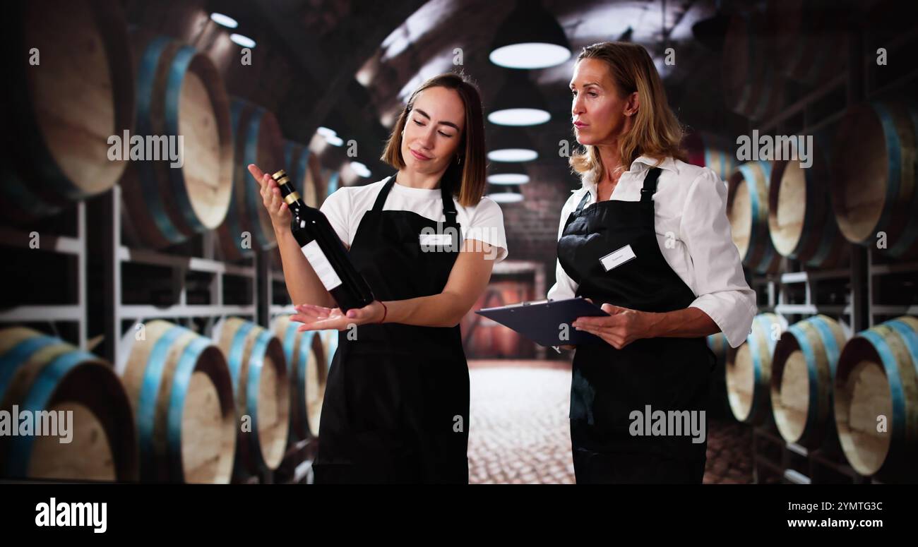 Professional Sommelier Business. Woman Holding Wine Bottle Stock Photo ...