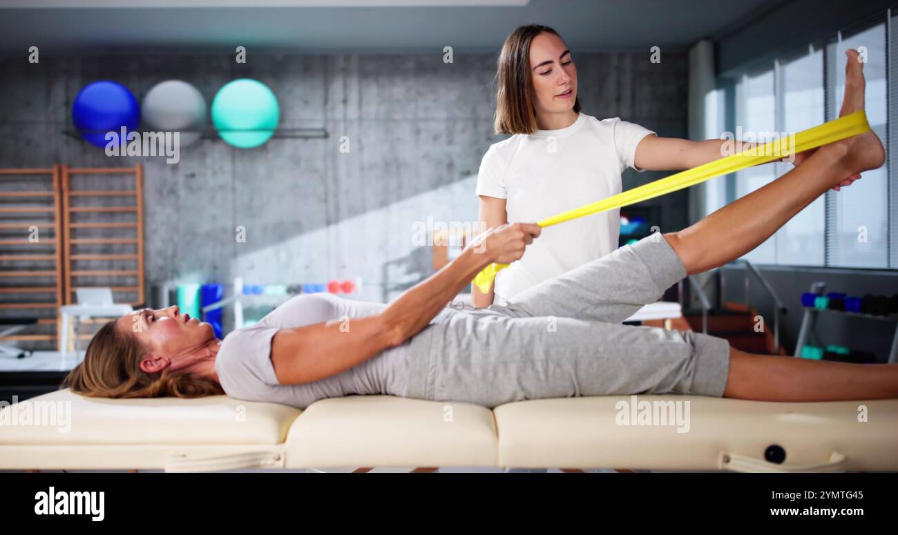 Therapy Band Exercise. Therapeutic Physio Rehab Training Stock Photo ...