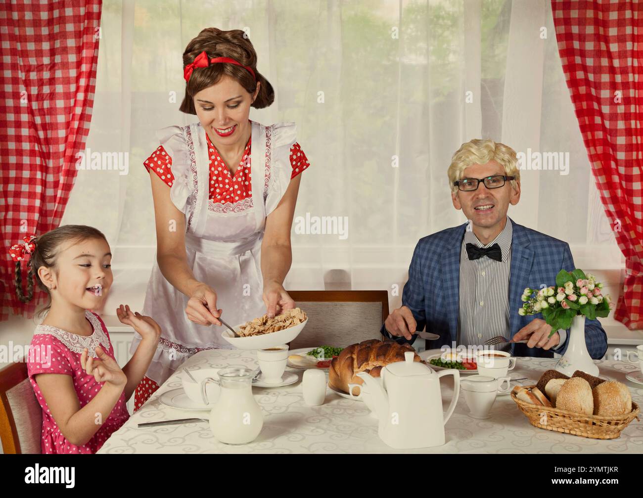 Vintage styled family have breakfast at home. Monochrome, grunge ...