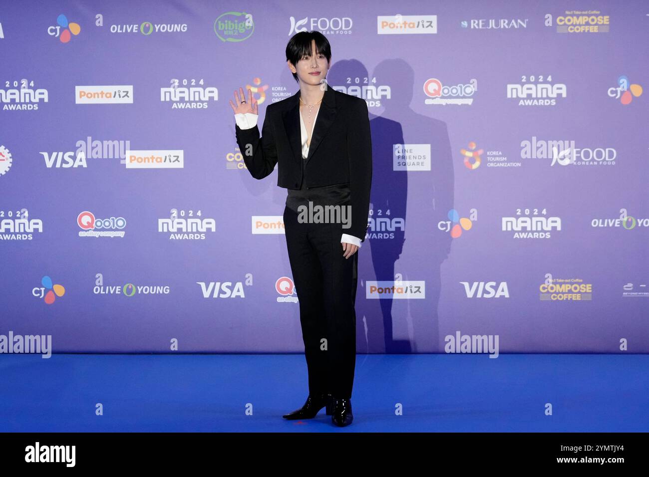 South Korean singer and actor Yim Si-wan arrives for the red carpet of the MAMA Awards in Osaka ...
