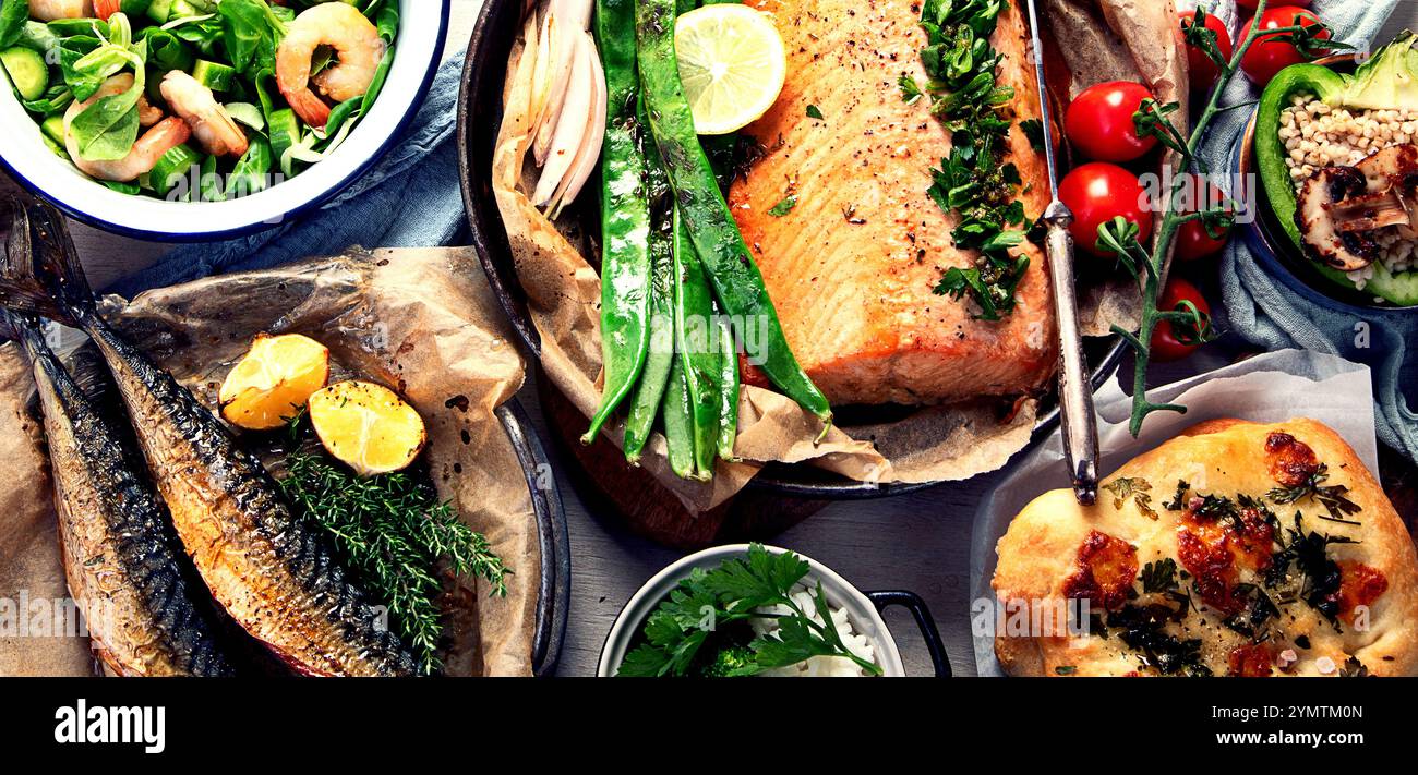 Assorted healthy seafood on plates for dinner or lunch. High in ...