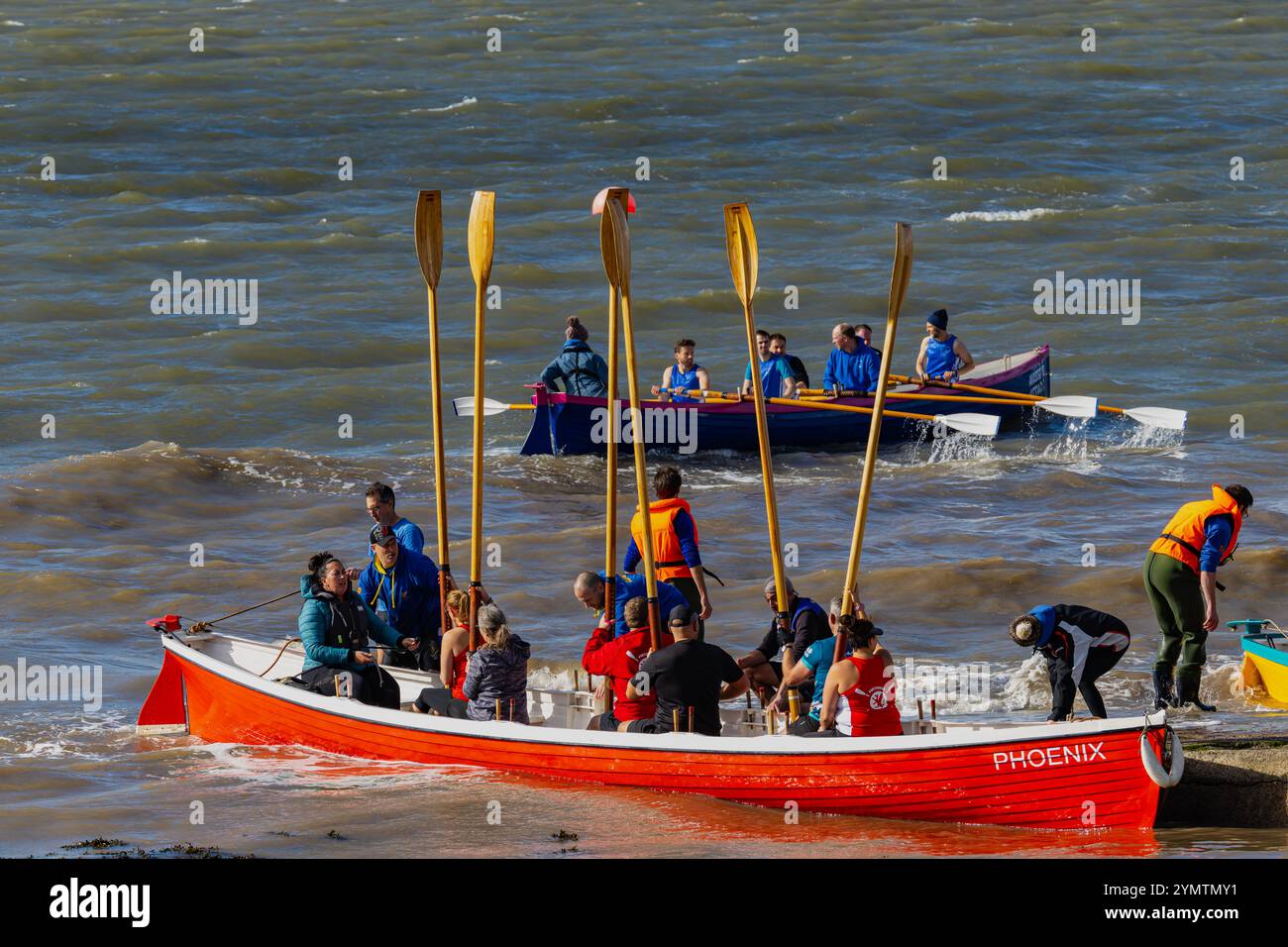 Pilot Gig along side Clevedon slipway to change crew Stock Photo - Alamy