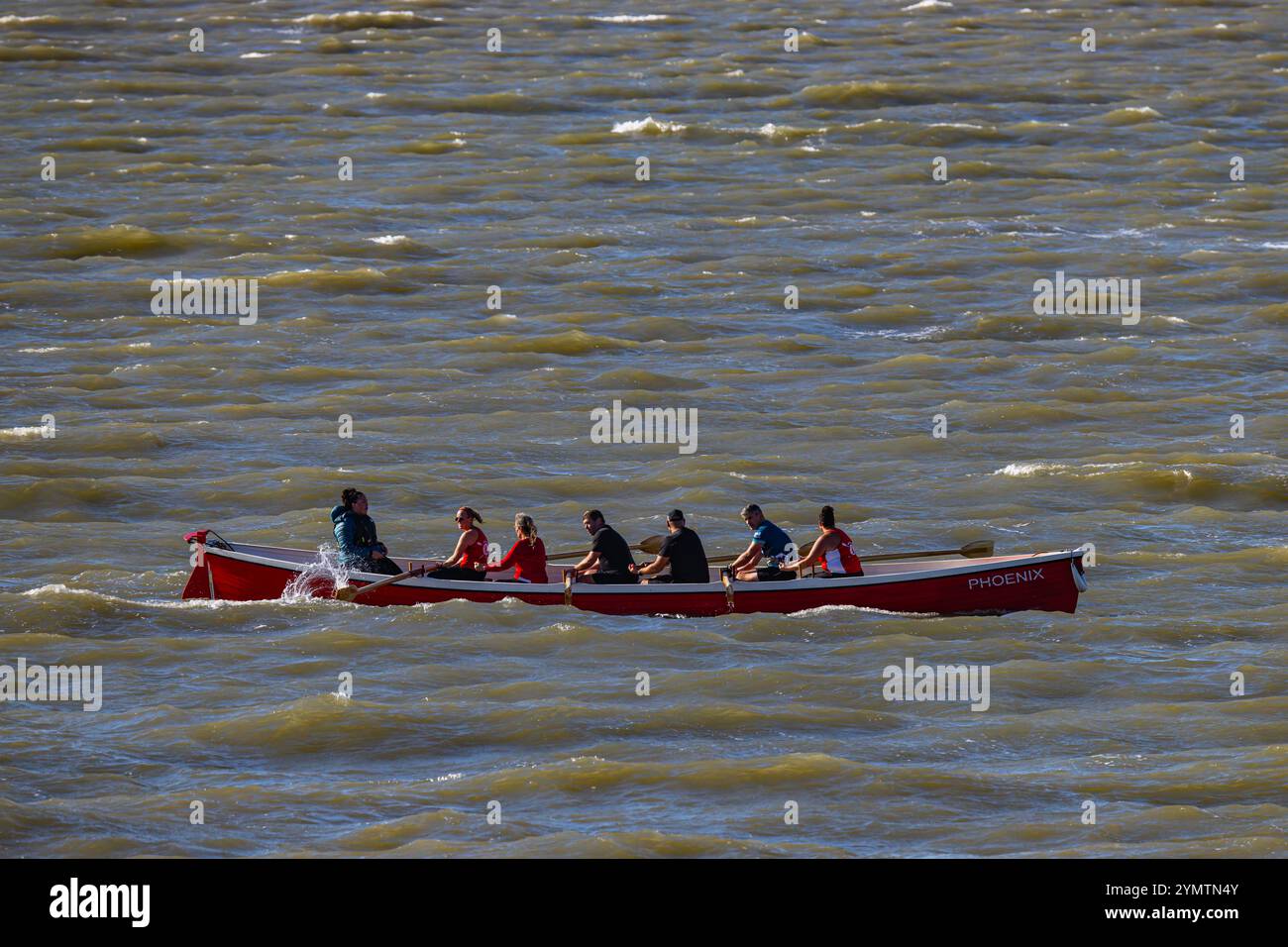 Pilot Gig racing on the Severn Estuary with choppy seas Stock Photo - Alamy