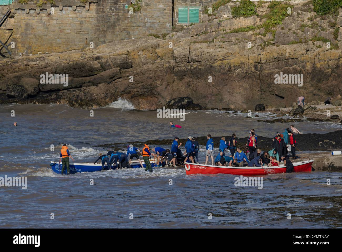 Pilot gigs coming into Clevedon Slipway to change crews Stock Photo - Alamy