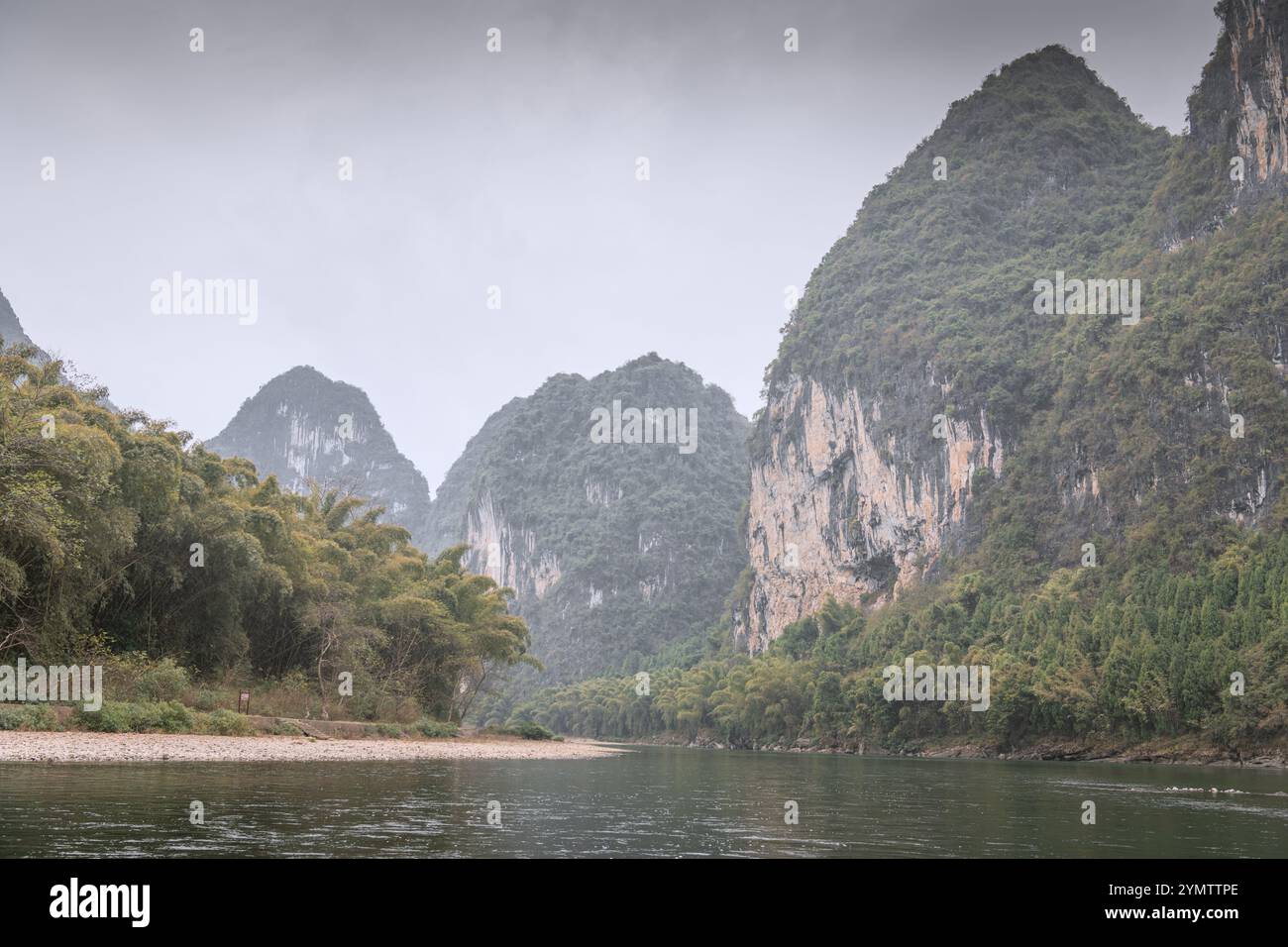 Bamboo and the limestone mountains at the Li river around Xing Ping ...