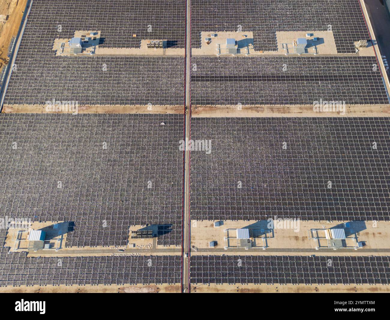 Eco building or factory in aerial view consist of solar or photovoltaic ...