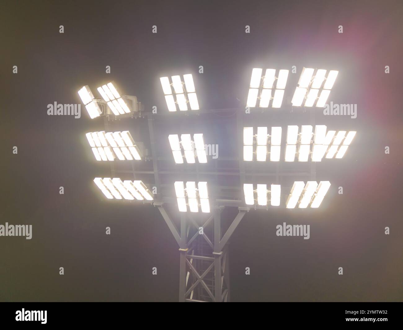 Soccer stadium lights reflectors with smoke and fog. Football field ...