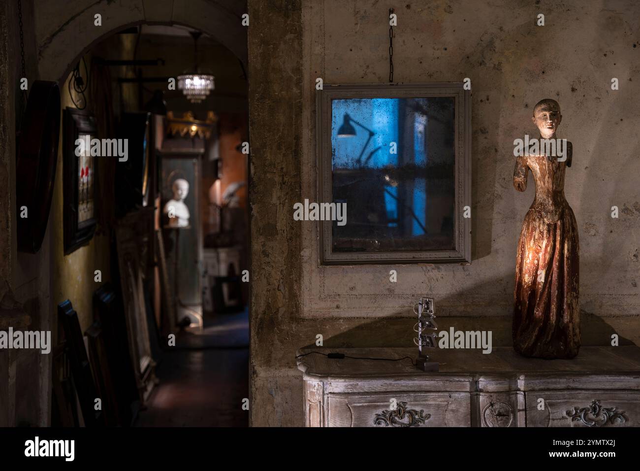 Shop window and interior of an antique store in Florence with old art ...