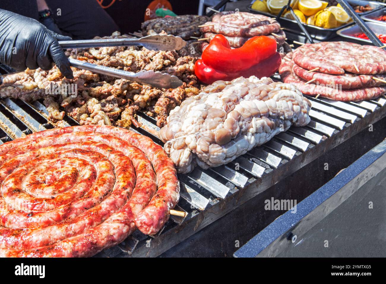Meat roasting on huge grill hi-res stock photography and images - Alamy