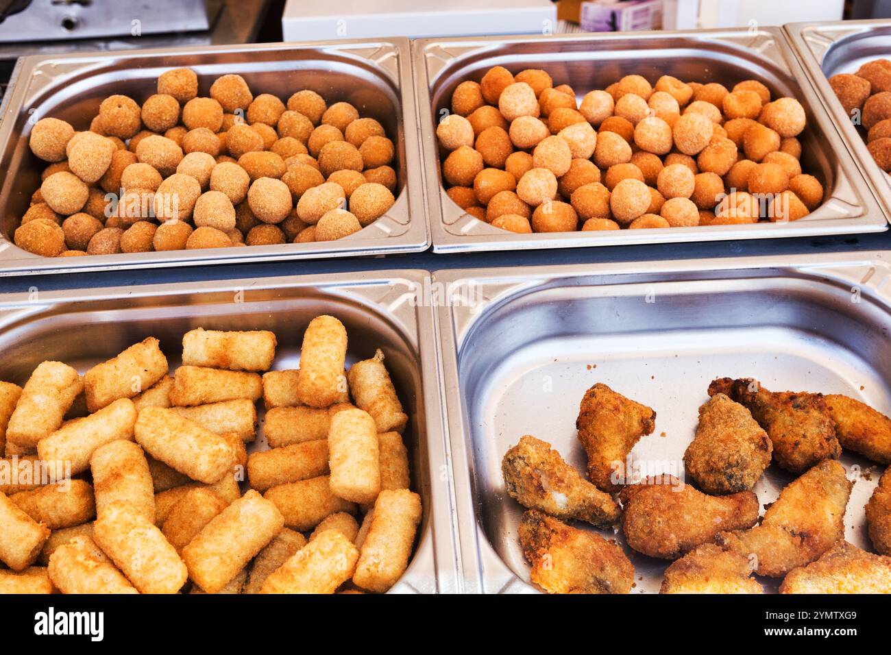 Fair stand with typical Italian street food with arancini, potato ...