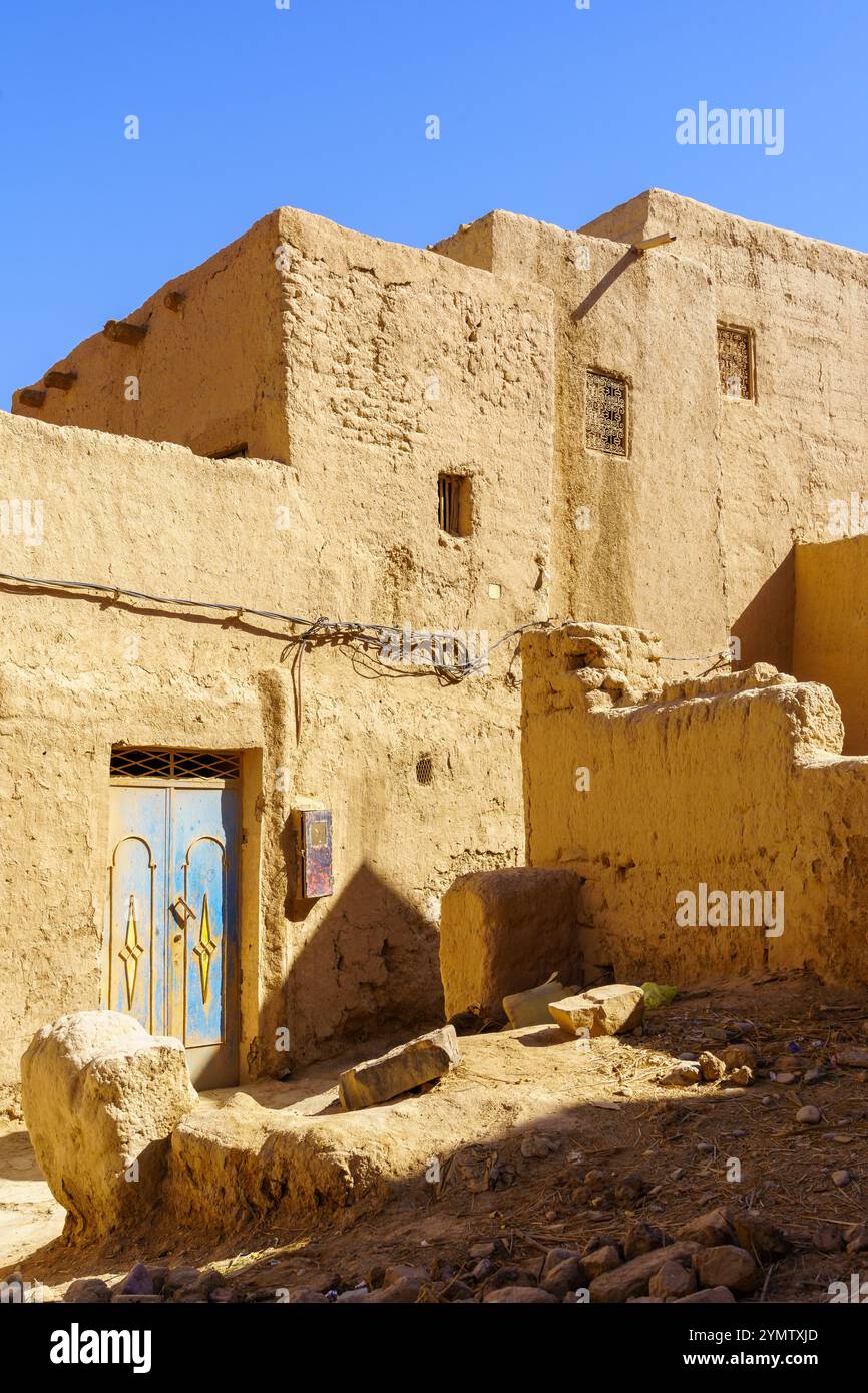 View of a typical mud house village, with various houses, in the Sahara ...