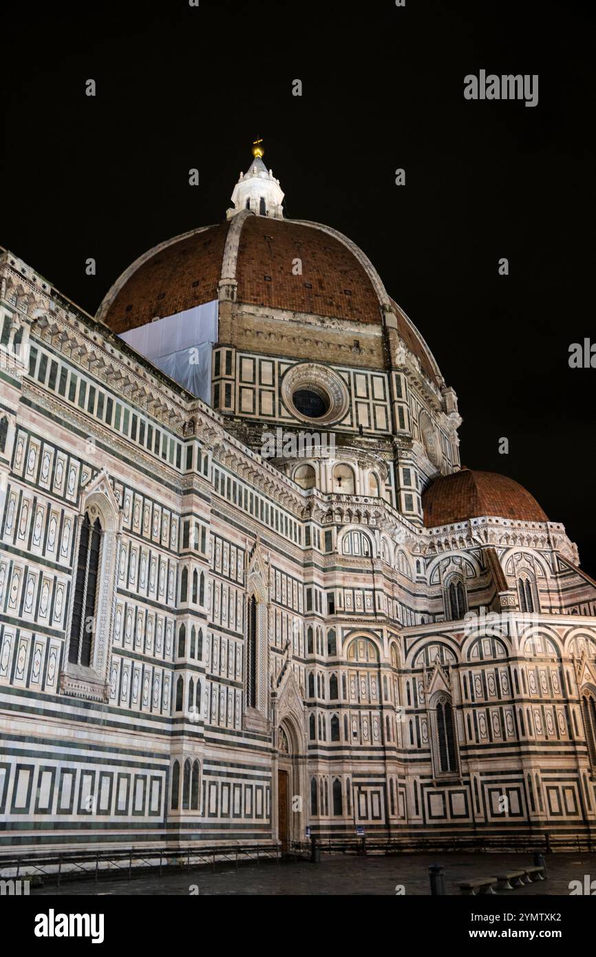 Night view of Ornate colorful marble facade of the Duomo Cathedral or ...