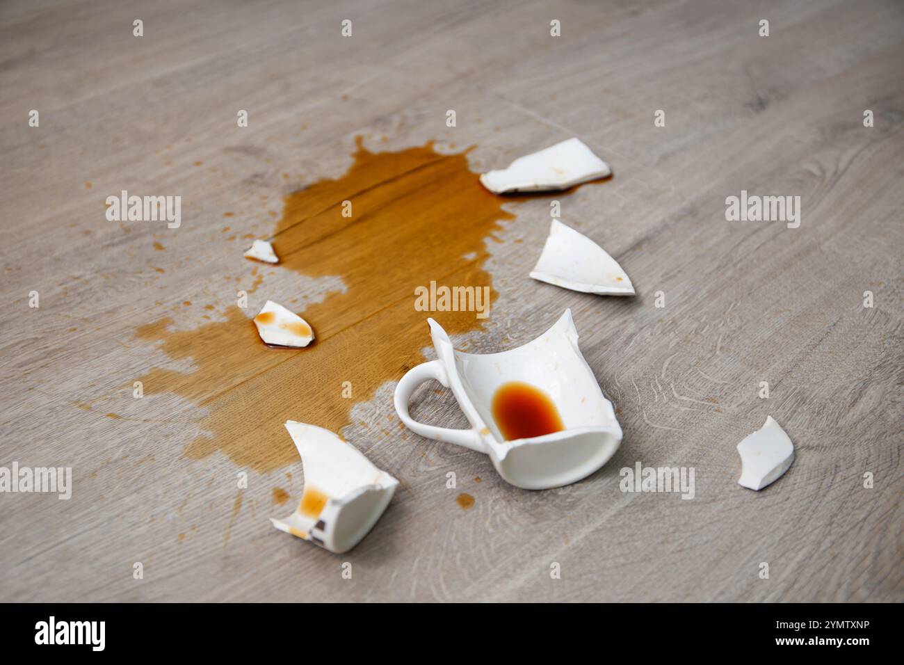 Spilled cup of coffee on floor hi-res stock photography and images - Alamy