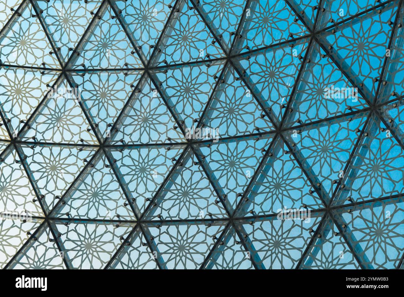 Abu Dhabi, UAE - January 4, 2024: Intricate geometric patterns adorn the dome of a modern ...