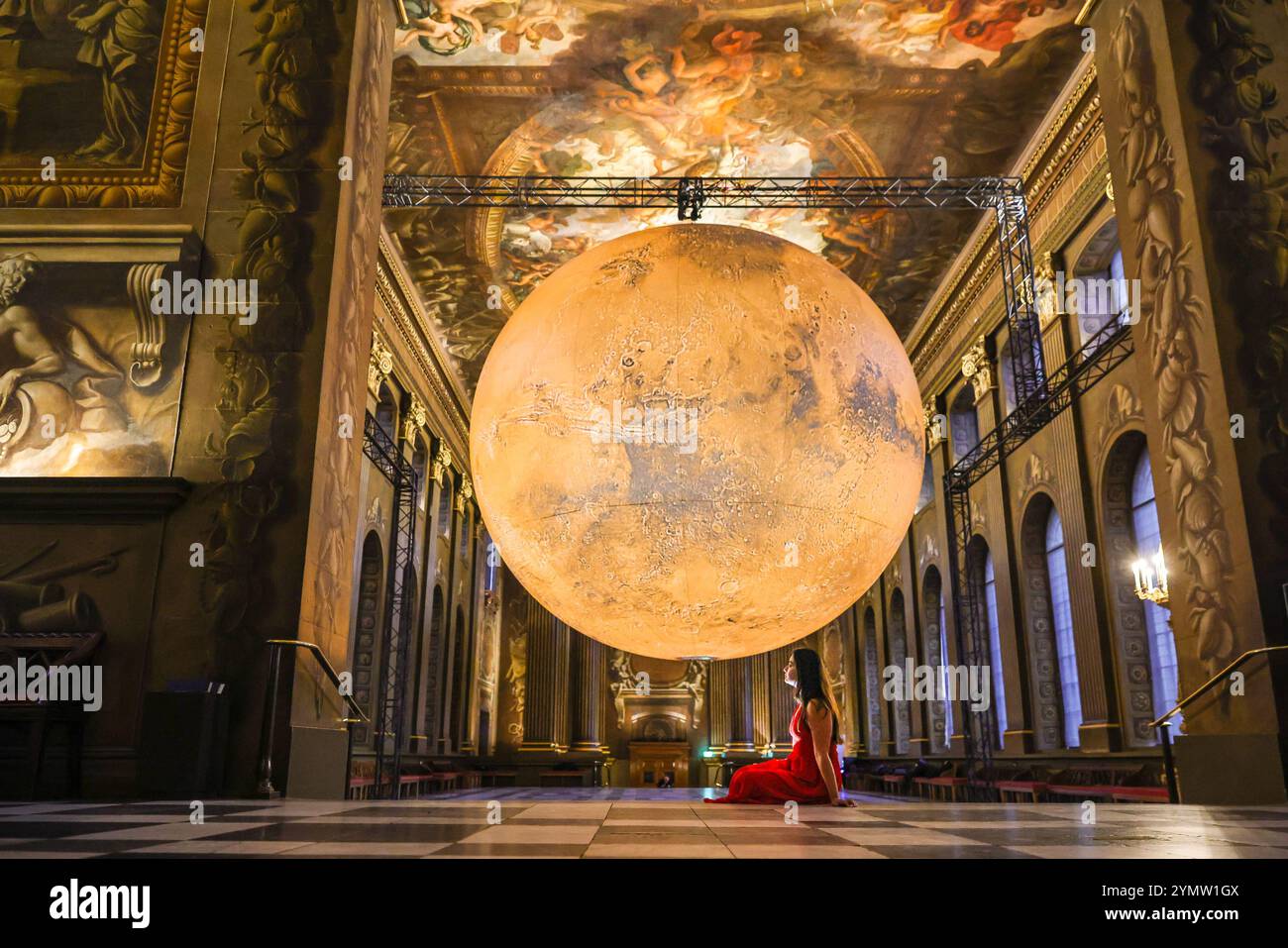 London, UK, 23rd Nov 2024. Staff pose with the installation. The Old ...