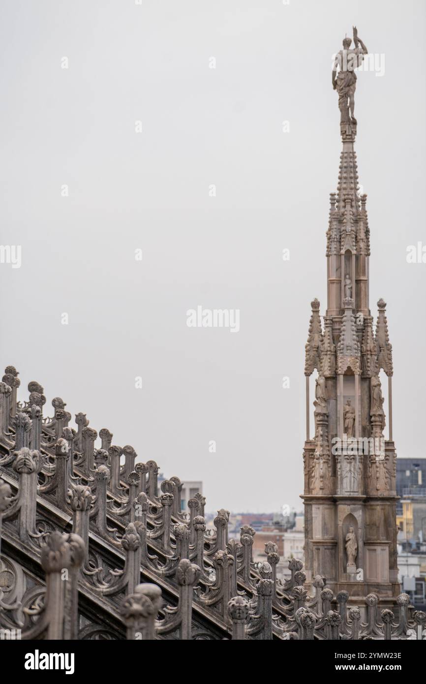 Cityscape rooftop view at exquisite gothic architecture of famous Duomo ...