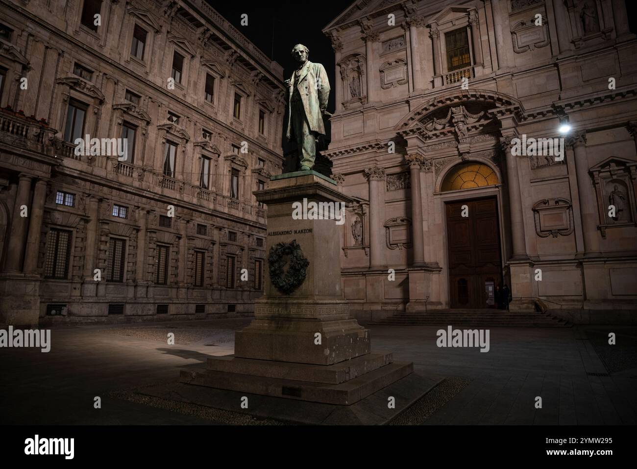 Bronze statue of Italian writer Alessandro Manzoni in San Fedele square ...