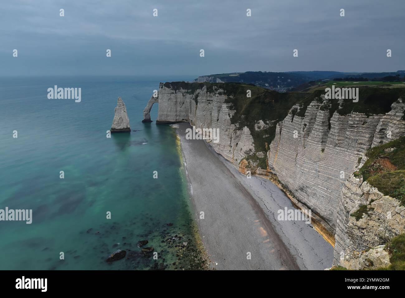 Northeastward view at dawn along the Plage Jambourg Beach and Falaise ...