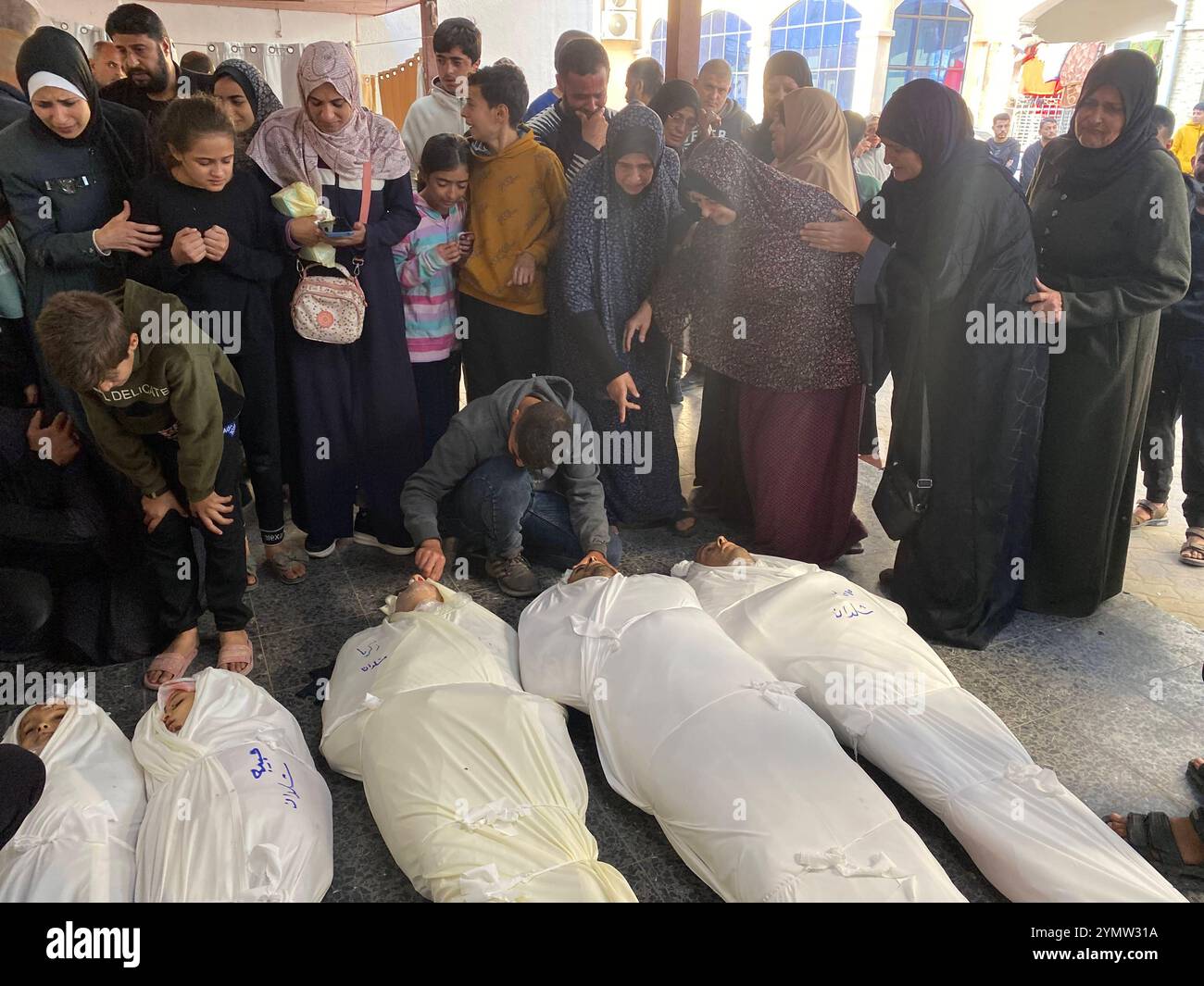 Relatives of the Palestinian Shaladan family, who died as a result of ...