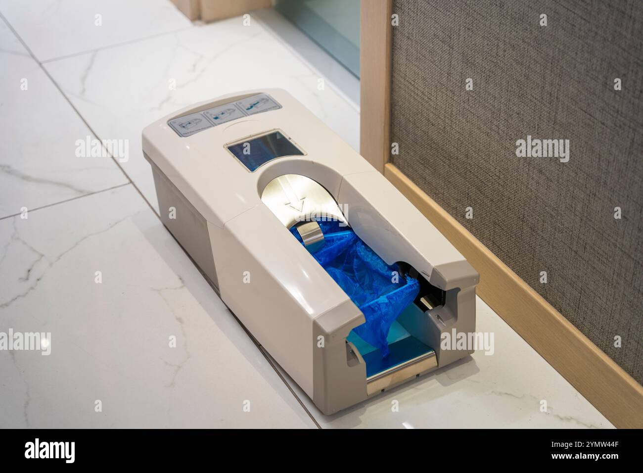 Automatic device for Shoe covers machine, close-up. Shoe cover ...