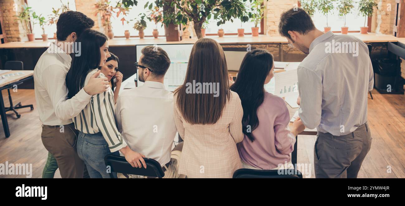 Back rear spine view photo of focused man woman work computer start-up ...