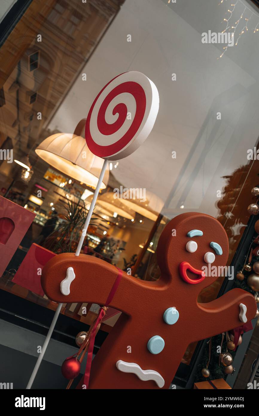 Cute outdoor Christmas decor of funny cartoon gingerbread man with ...