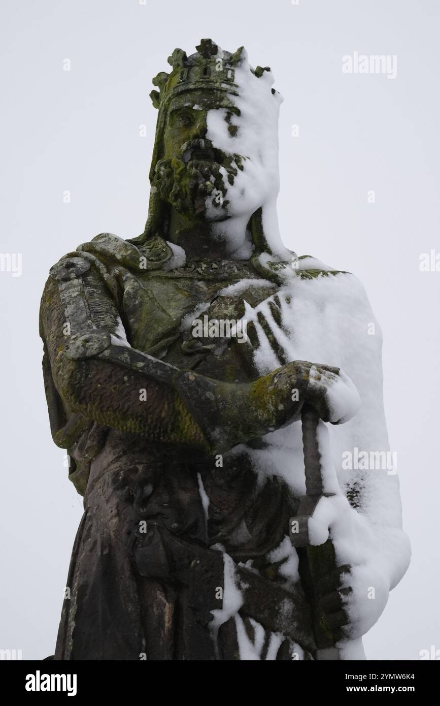Snow settles on the statue of Robert the Bruce at Stirling Castle ...