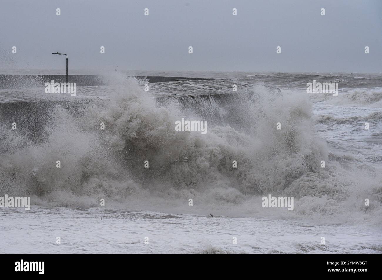 Lyme Regis, Dorset, UK. 23rd Nov, 2024. UK Weather: Giant waves batter ...