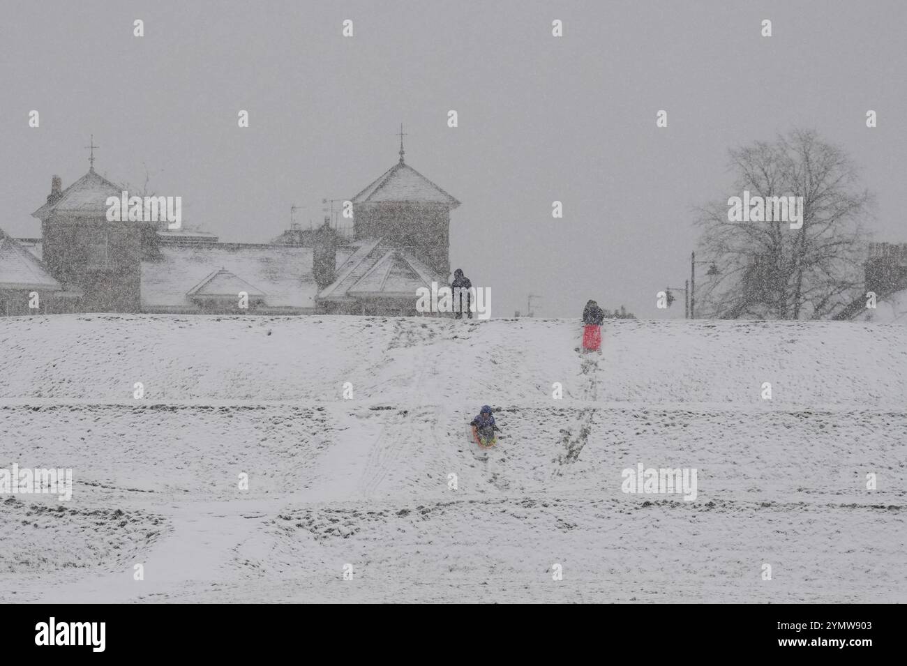 People walk in the snow at Stirling Castle, Stirling, Scotland. Storm ...