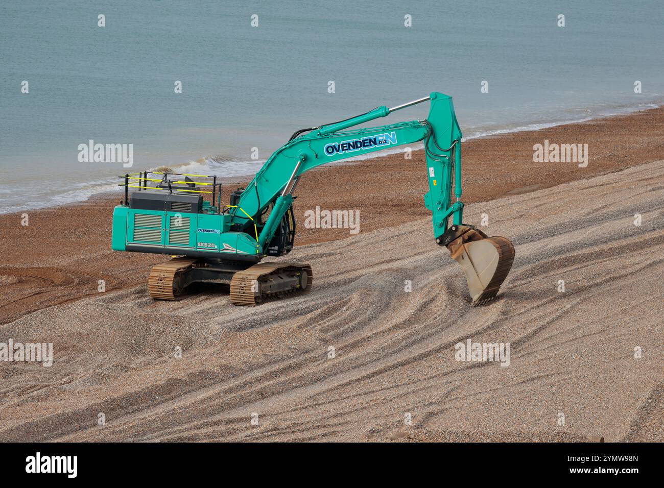Turquoise backhoe loader hi-res stock photography and images - Alamy