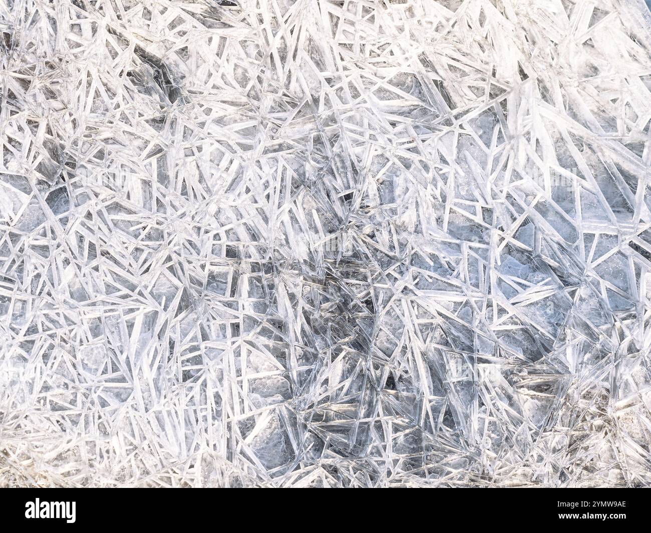 Patterns in frozen ice Stock Photo - Alamy