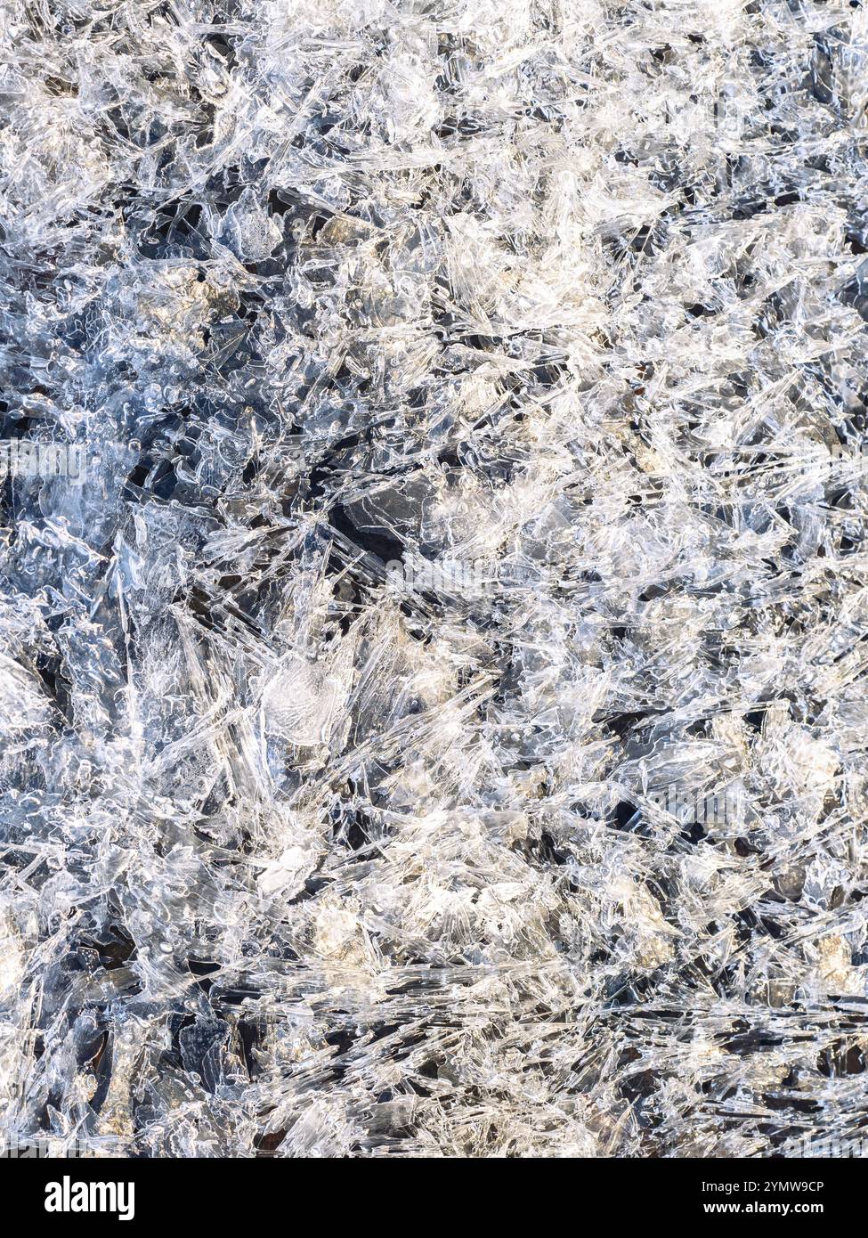 Patterns in frozen ice Stock Photo - Alamy