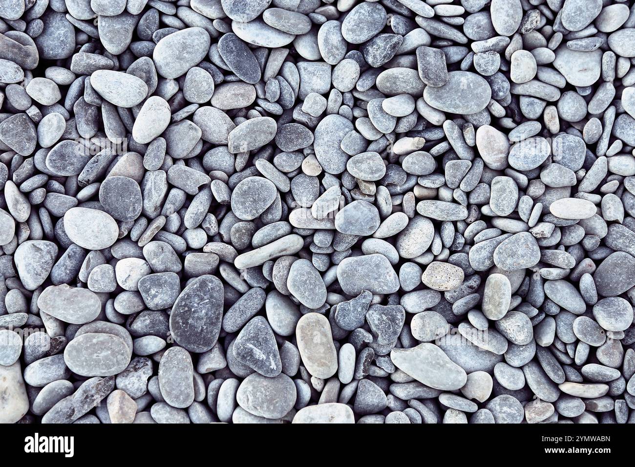 Nature background from gray sea pebbles Stock Photo - Alamy