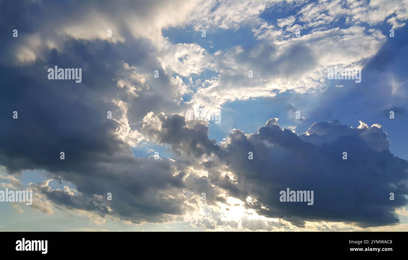 Sunlight and grey clouds hi-res stock photography and images - Alamy
