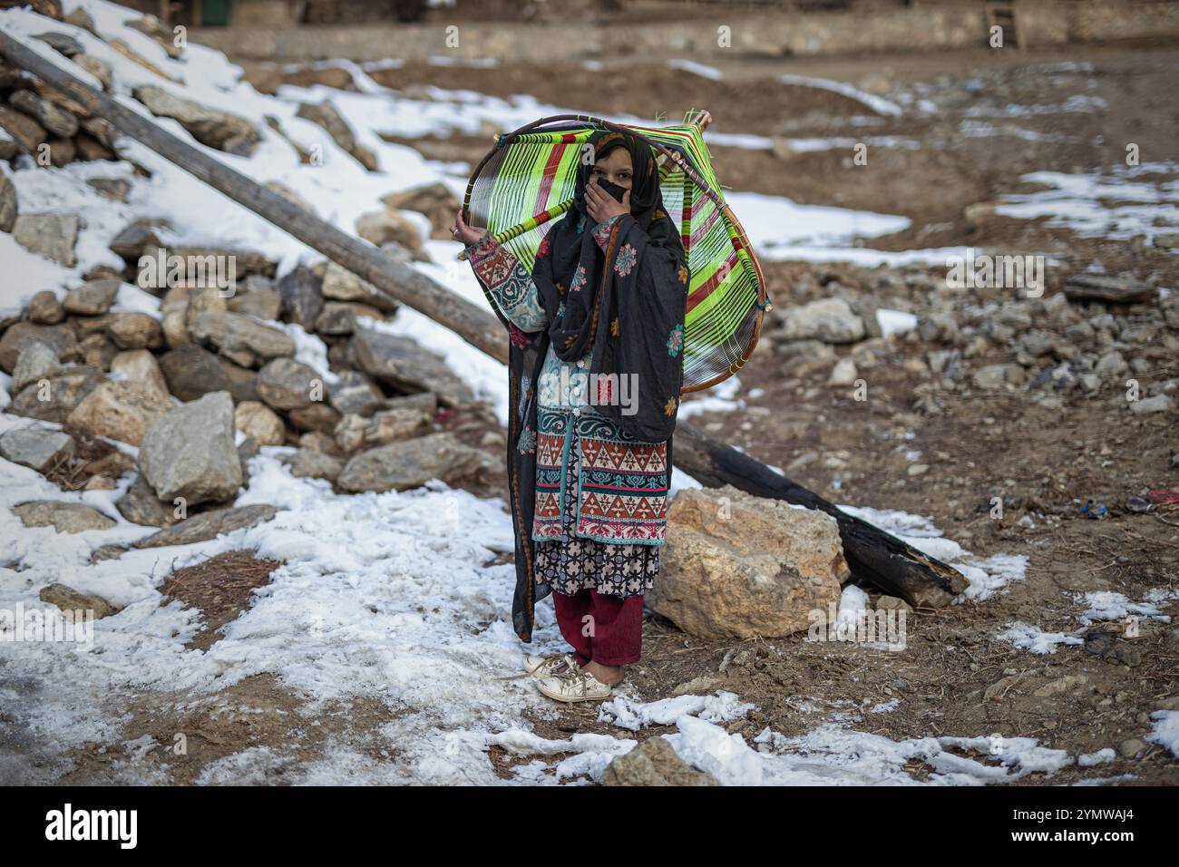 A Nuristani girl wearing a completely handmade, traditional Nuristani ...