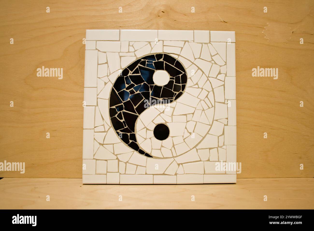 A Yin-Yang symbol in mosaic art form made using ceramic tiles and tile ...