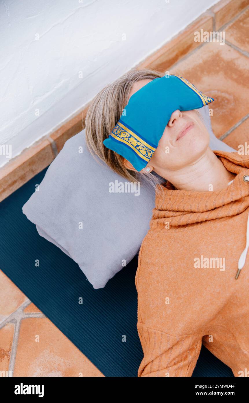 Details of woman in relaxing yin yoga pose on outdoor terrace Stock ...