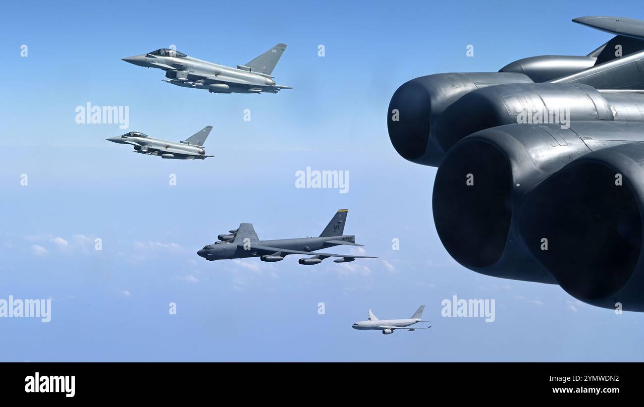 Two Royal Air Force Eurofighter Typhoons and a RAF Voyager aerial ...