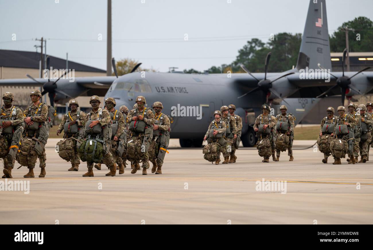 U.S. Army paratroopers assigned to the 82nd Airborne Division walk to ...