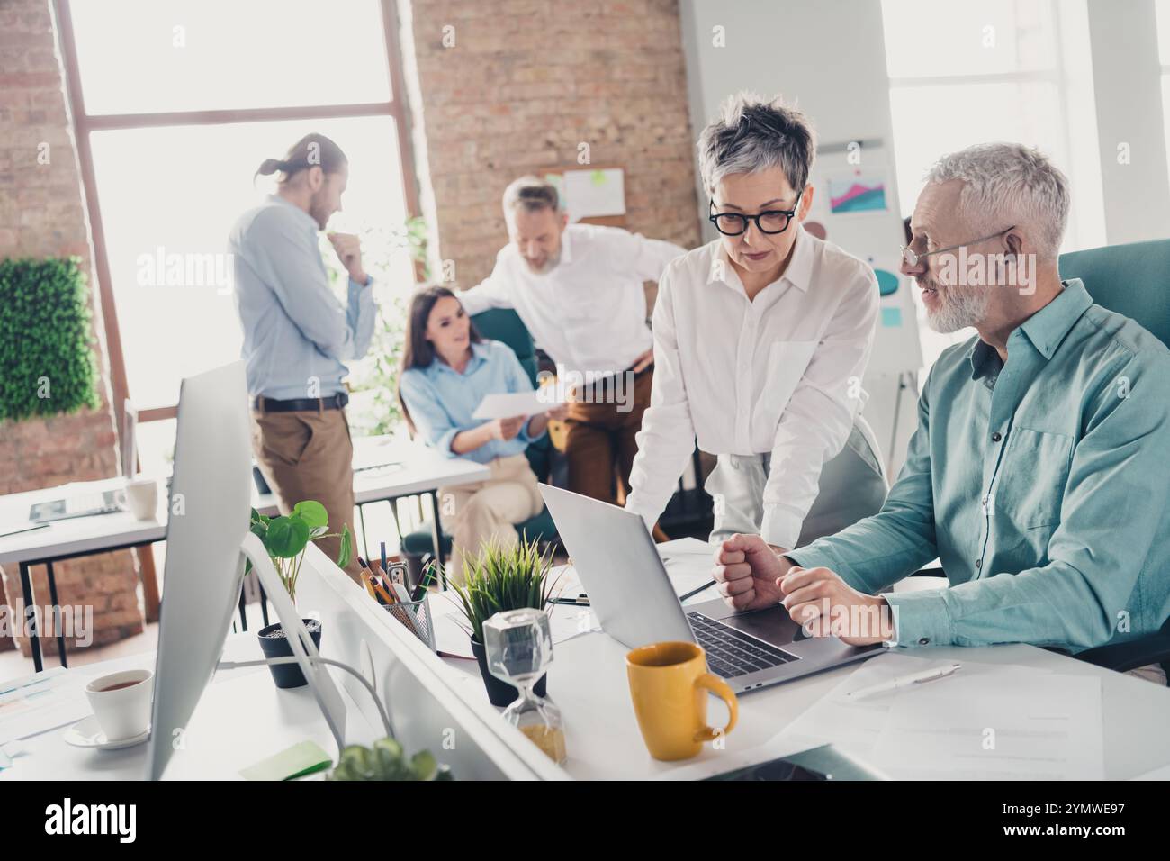 Photo of teamwork startup partners teambuilding discuss comfortable ...